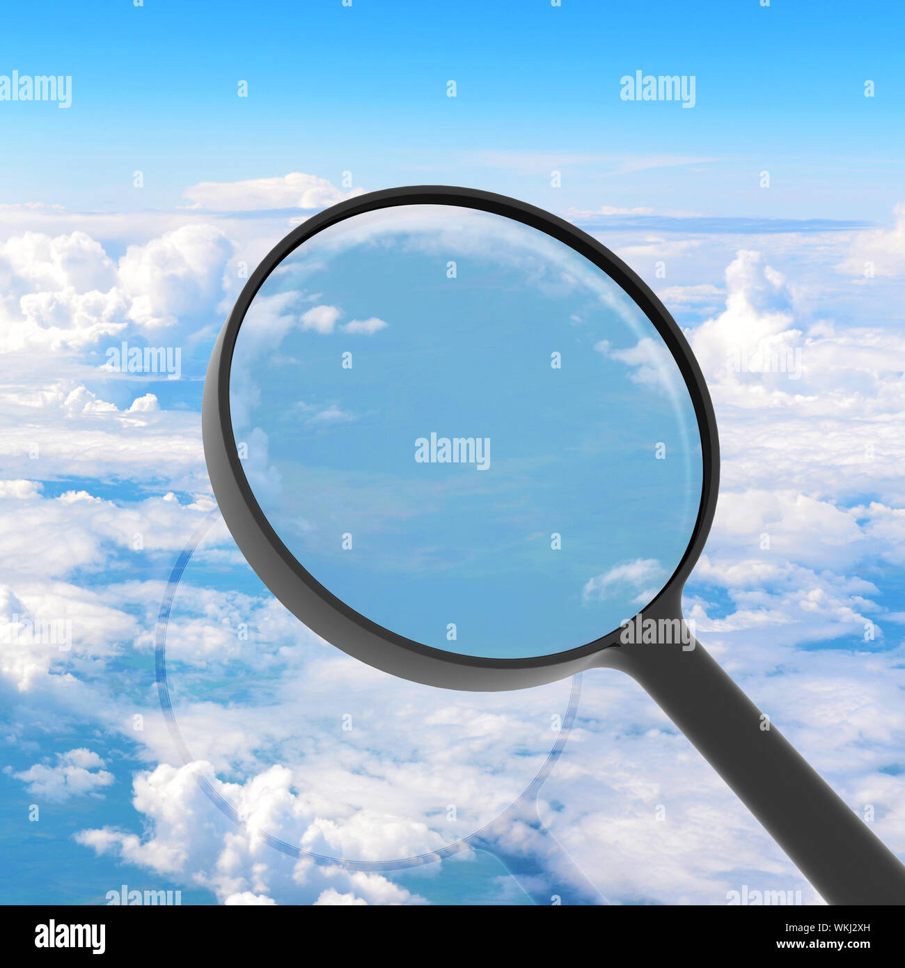 Magnifying glass looking sky in background. View from above the clouds ...