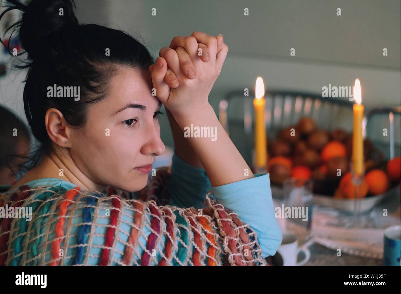 Young woman sitting dining table hi-res stock photography and images ...