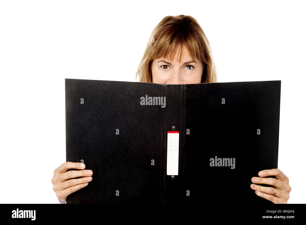 Female secretary standing behind a folder Stock Photo - Alamy