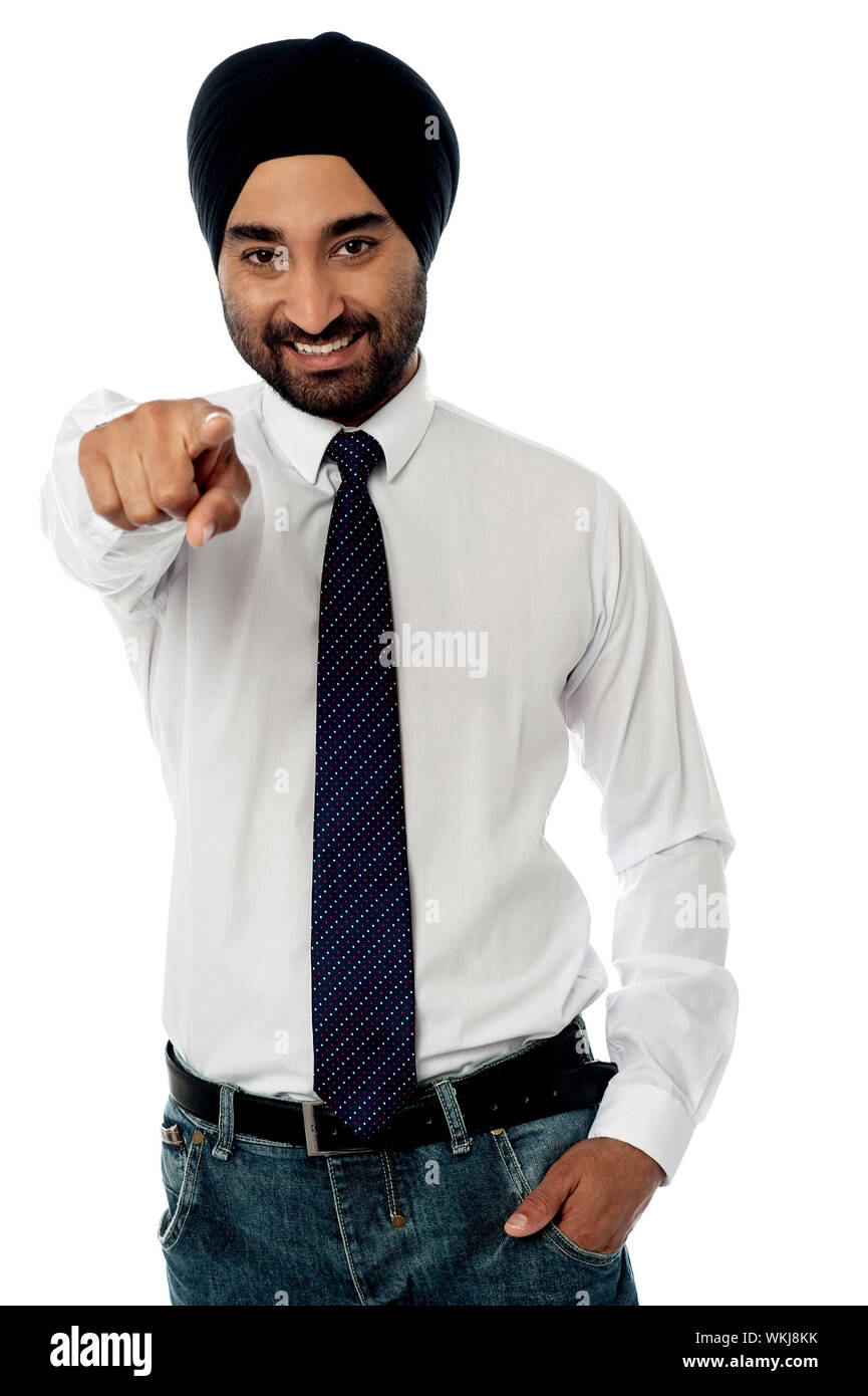 Young indian businessman pointing towards camera Stock Photo - Alamy