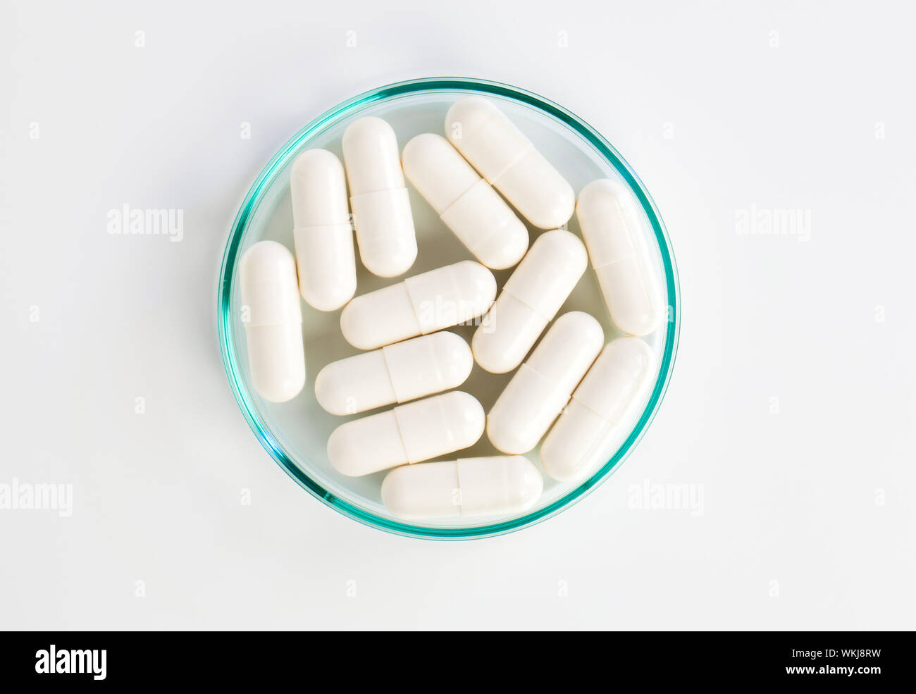 medical capsules on white background Stock Photo - Alamy