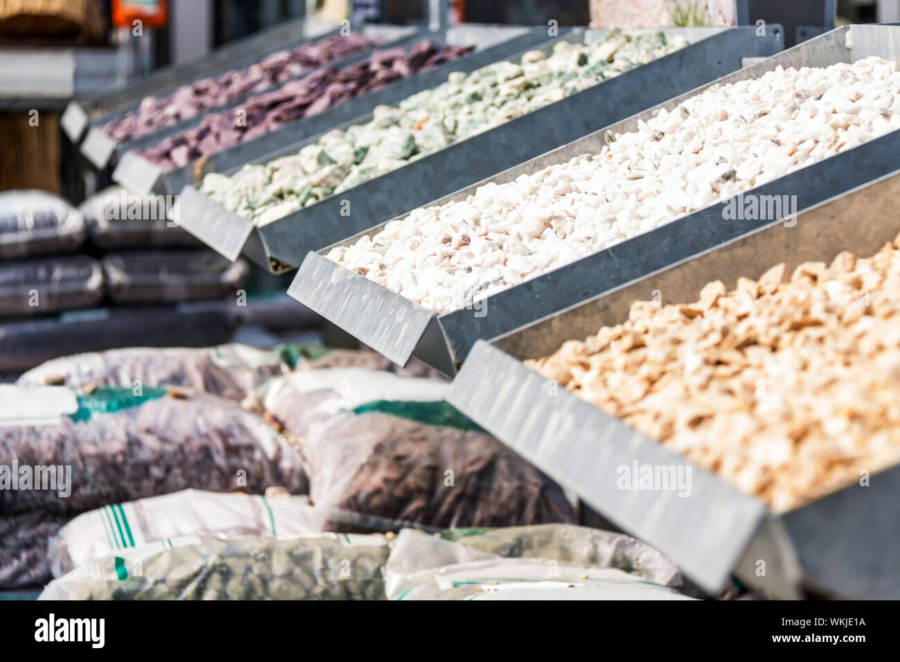 Stock at a nursery or landscaping business with weathered smooth stones ...