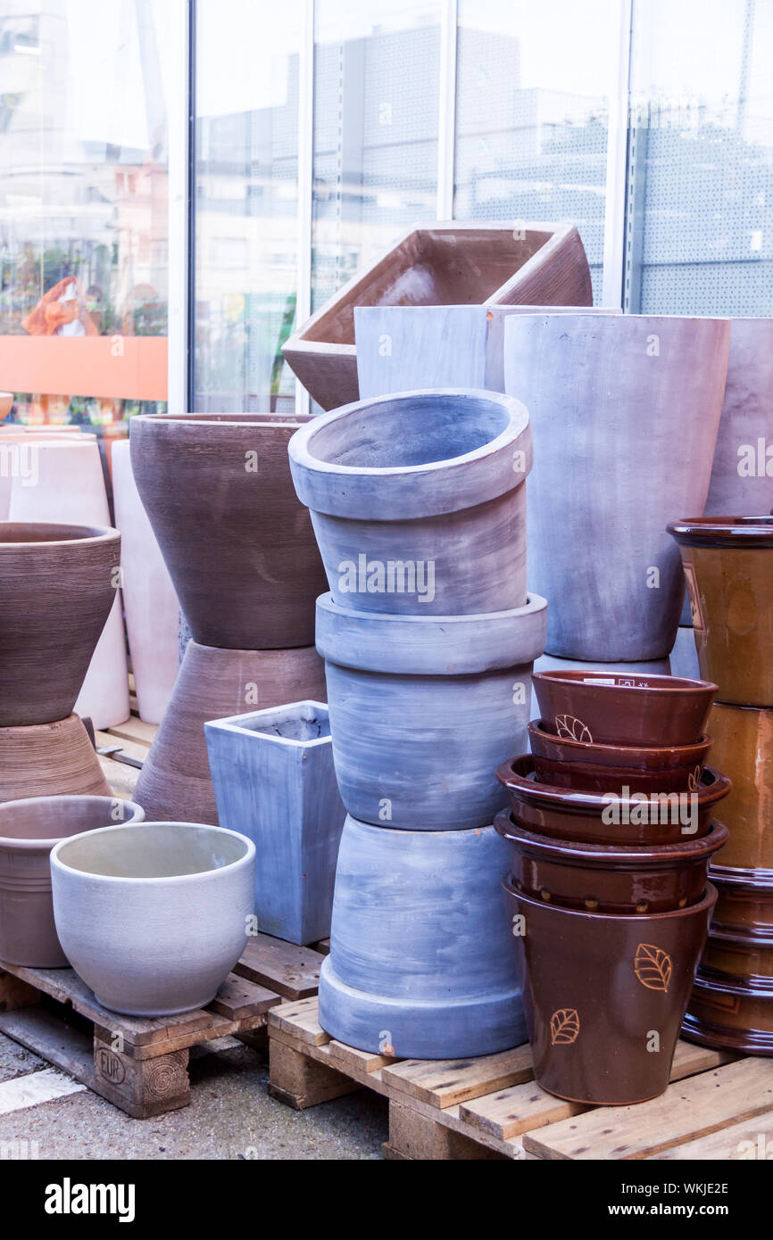 Glazed and unglazed ceramic flower pots in a variety of sizes and ...
