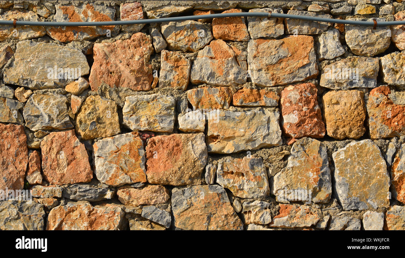 Wall of natural bricks. Close up construction background Stock Photo ...