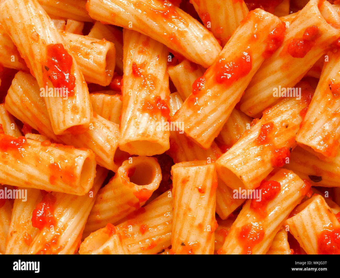 close up of maccheroni pasta in tomato sauce food background Stock ...