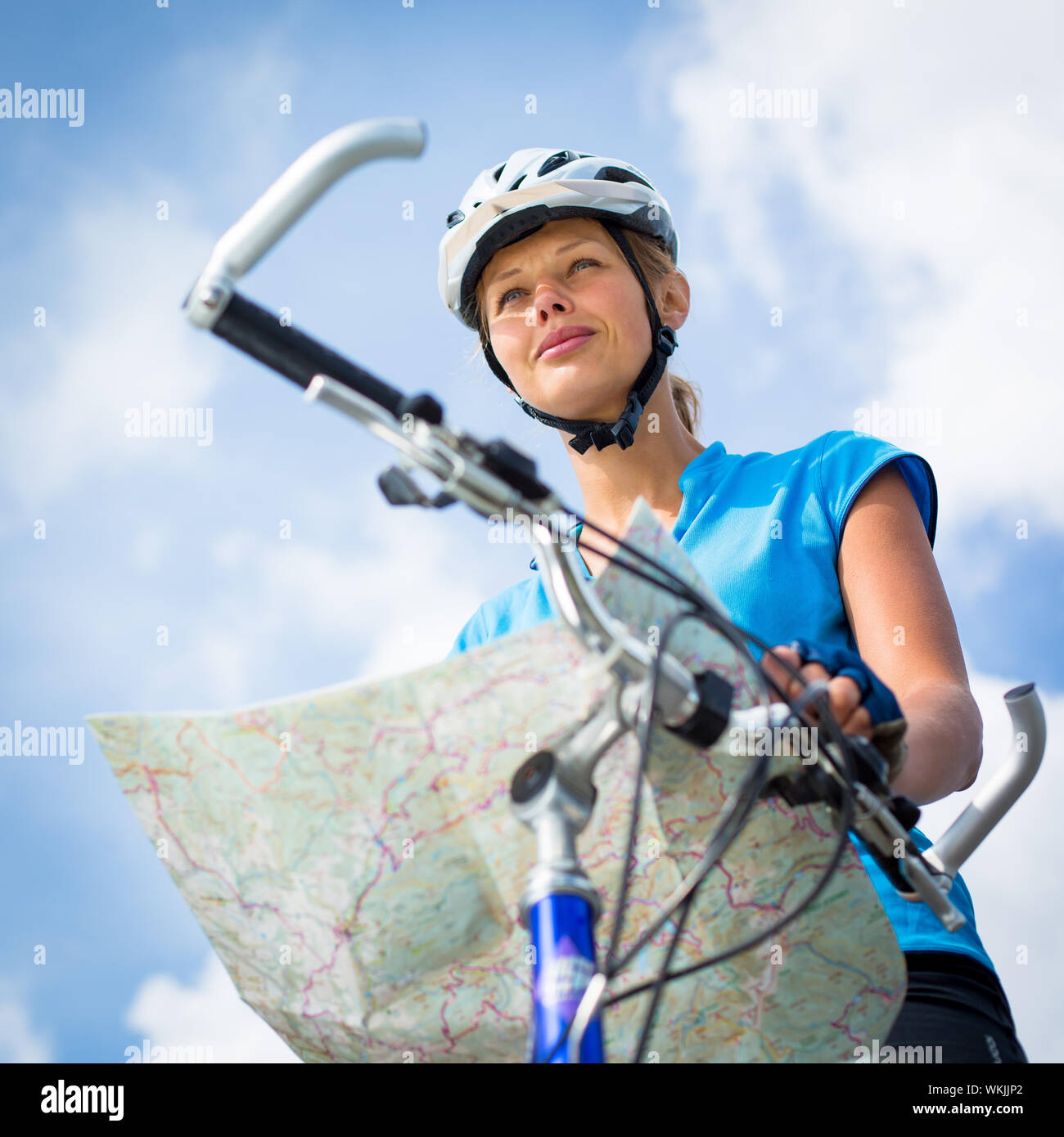 Cyclist reading map hi-res stock photography and images - Alamy