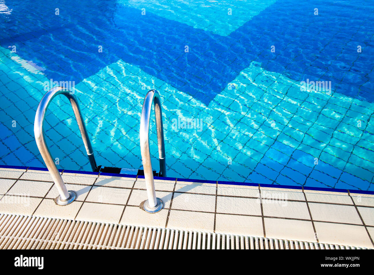 Blue water in a swimming pool Stock Photo - Alamy