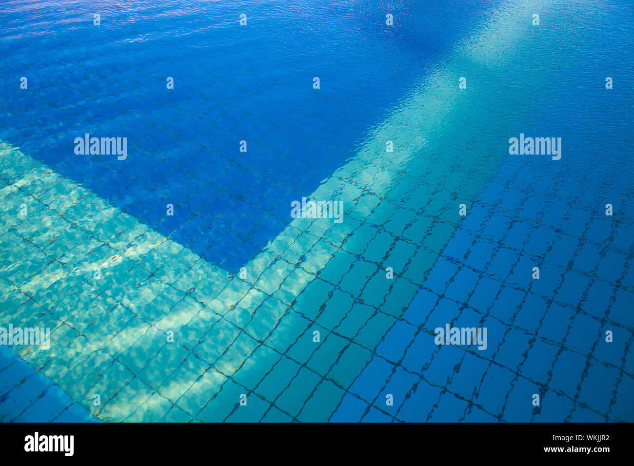 Blue water in a swimming pool Stock Photo - Alamy