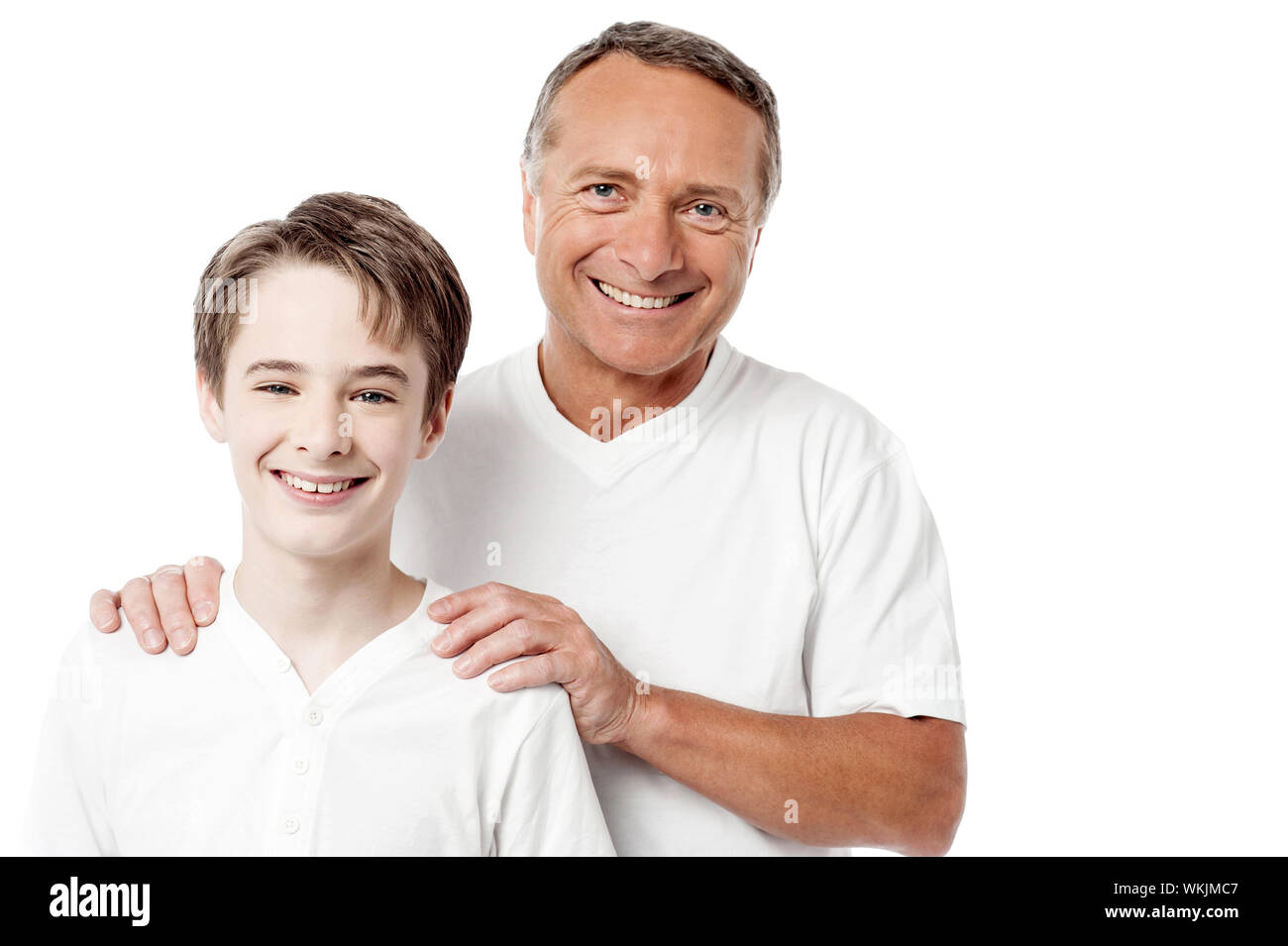 Father and son standing next to each other Stock Photo - Alamy