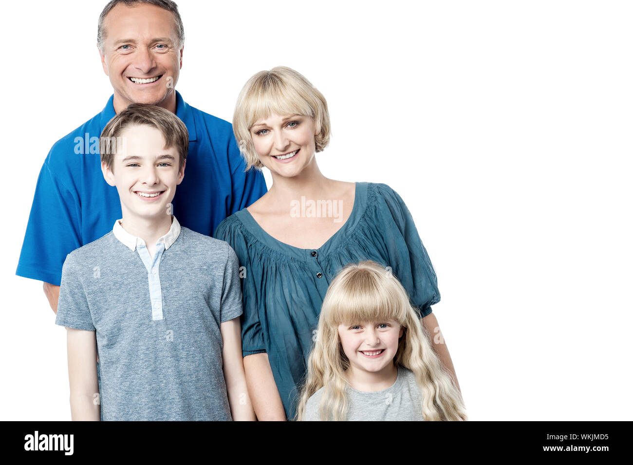 Happy family of four standing on white background Stock Photo - Alamy