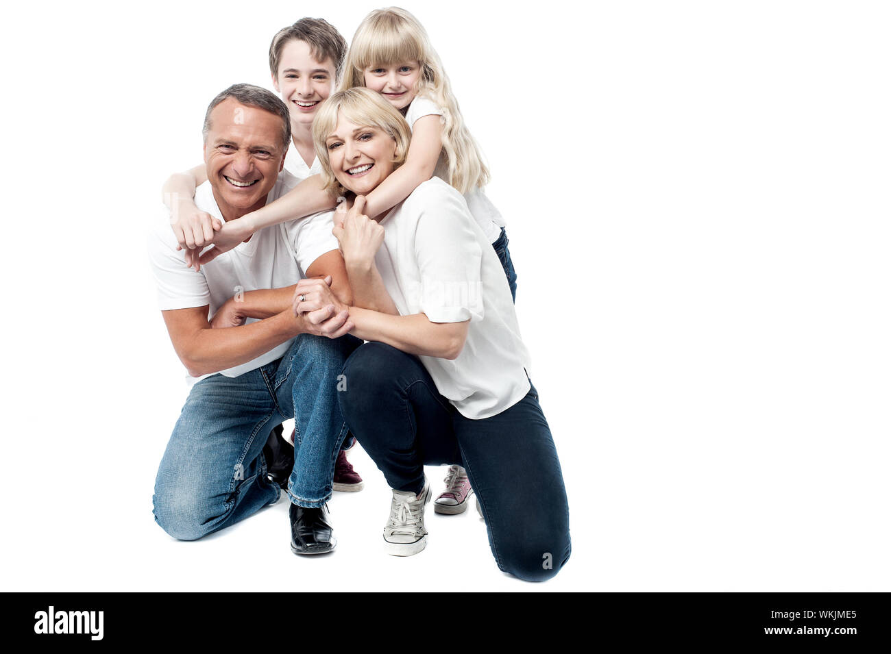 Happy family portrait smiling isolated over a white background Stock ...