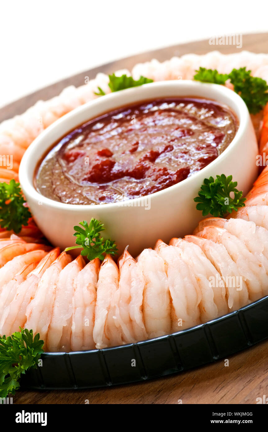 Shrimp ring appetizer platter with dipping sauce Stock Photo - Alamy