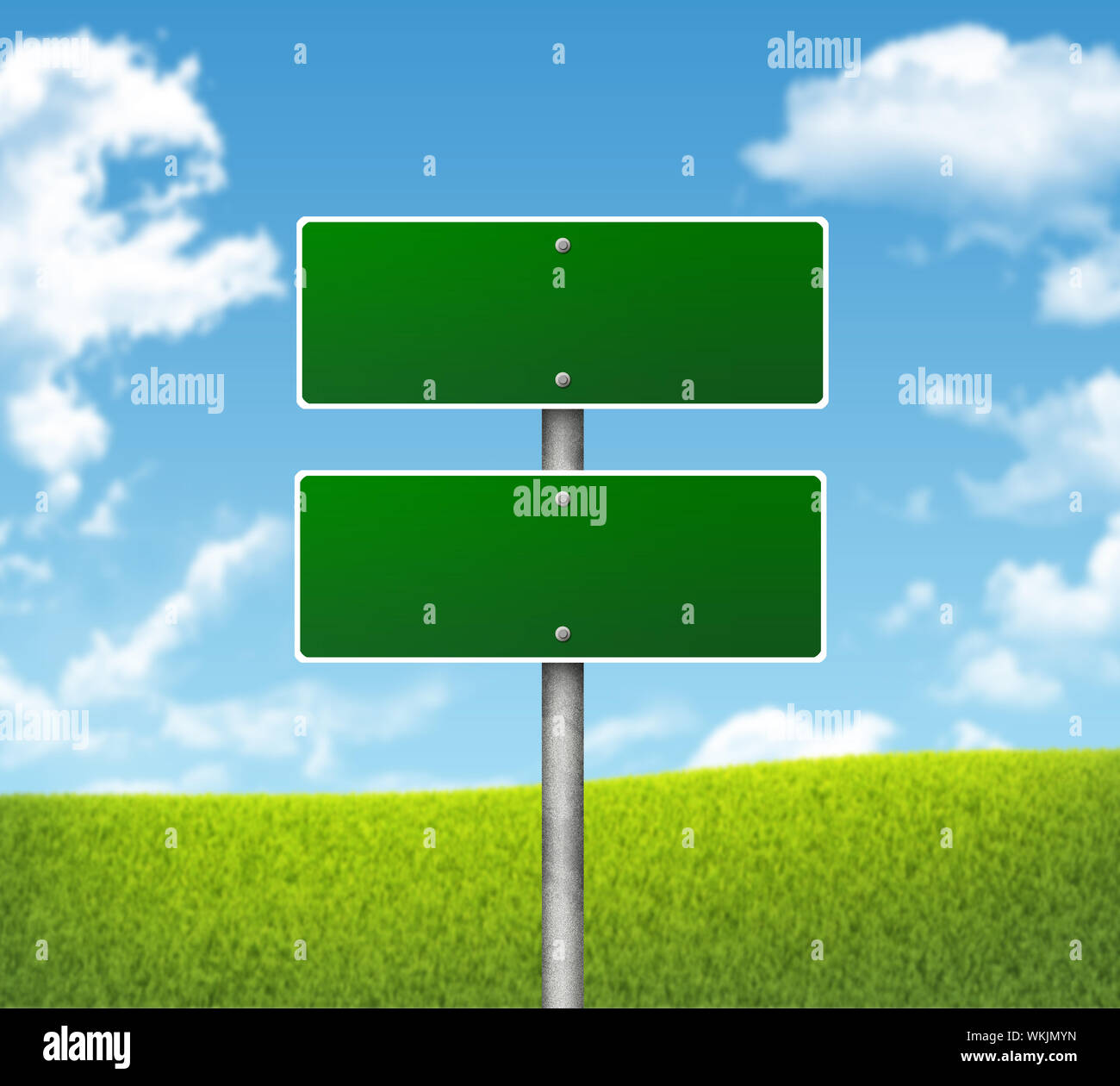 Crossroads road sign. Green grass and blue sky as backdrop Stock Photo ...