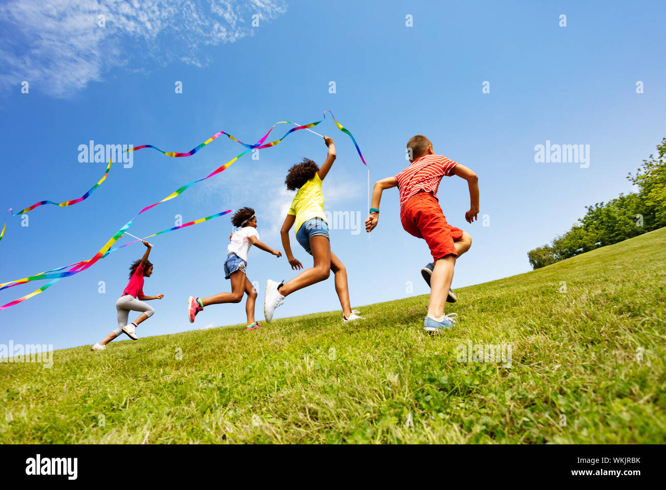 Children run park african hi-res stock photography and images - Alamy