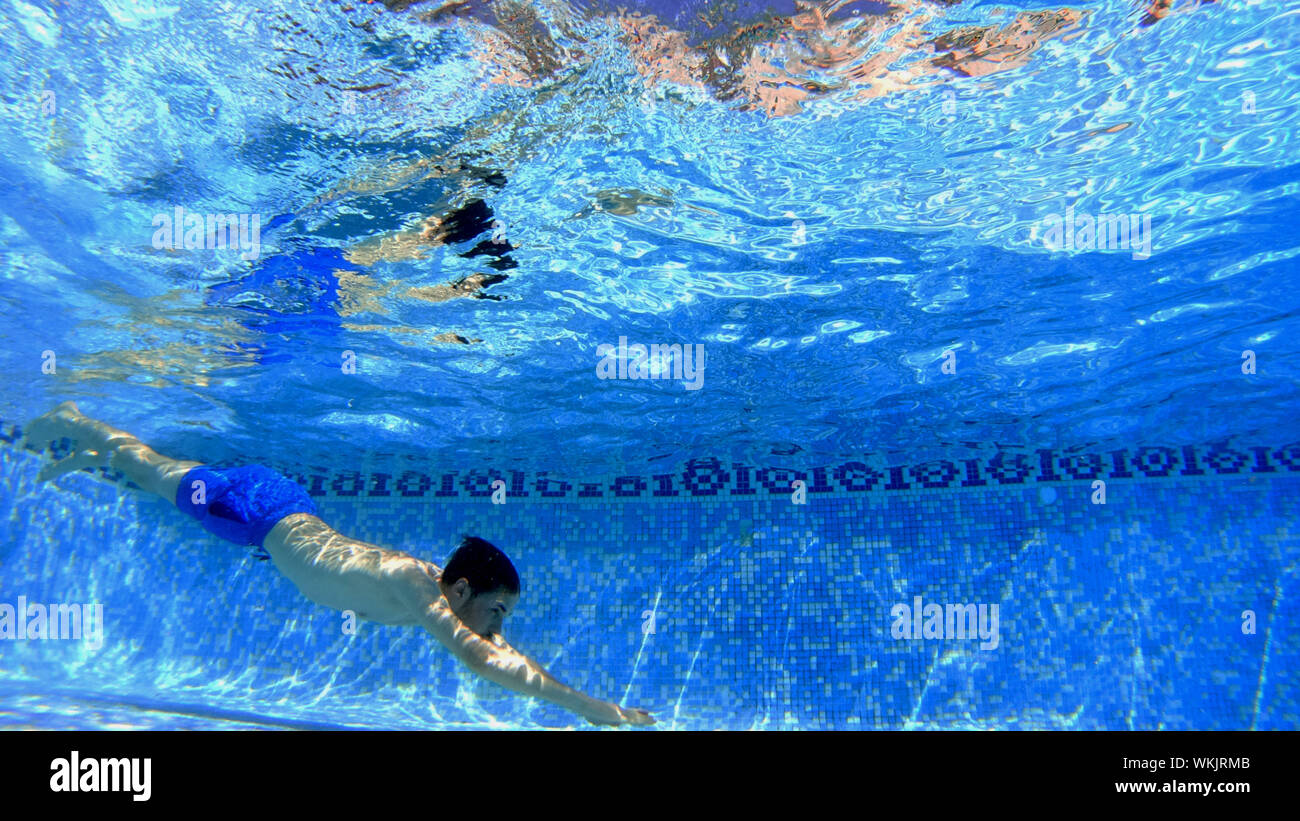Diving into pool hi-res stock photography and images - Alamy