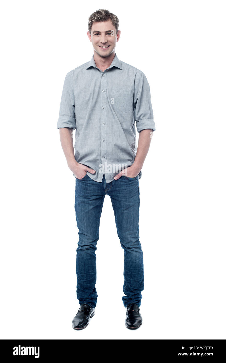 Full length image of handsome young man, hands in pockets Stock Photo ...