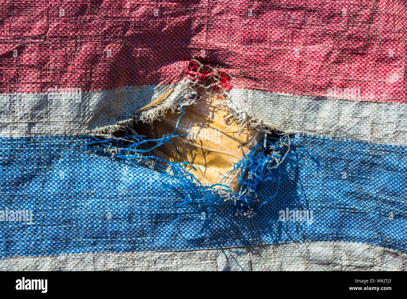 Torn sack hi-res stock photography and images - Alamy