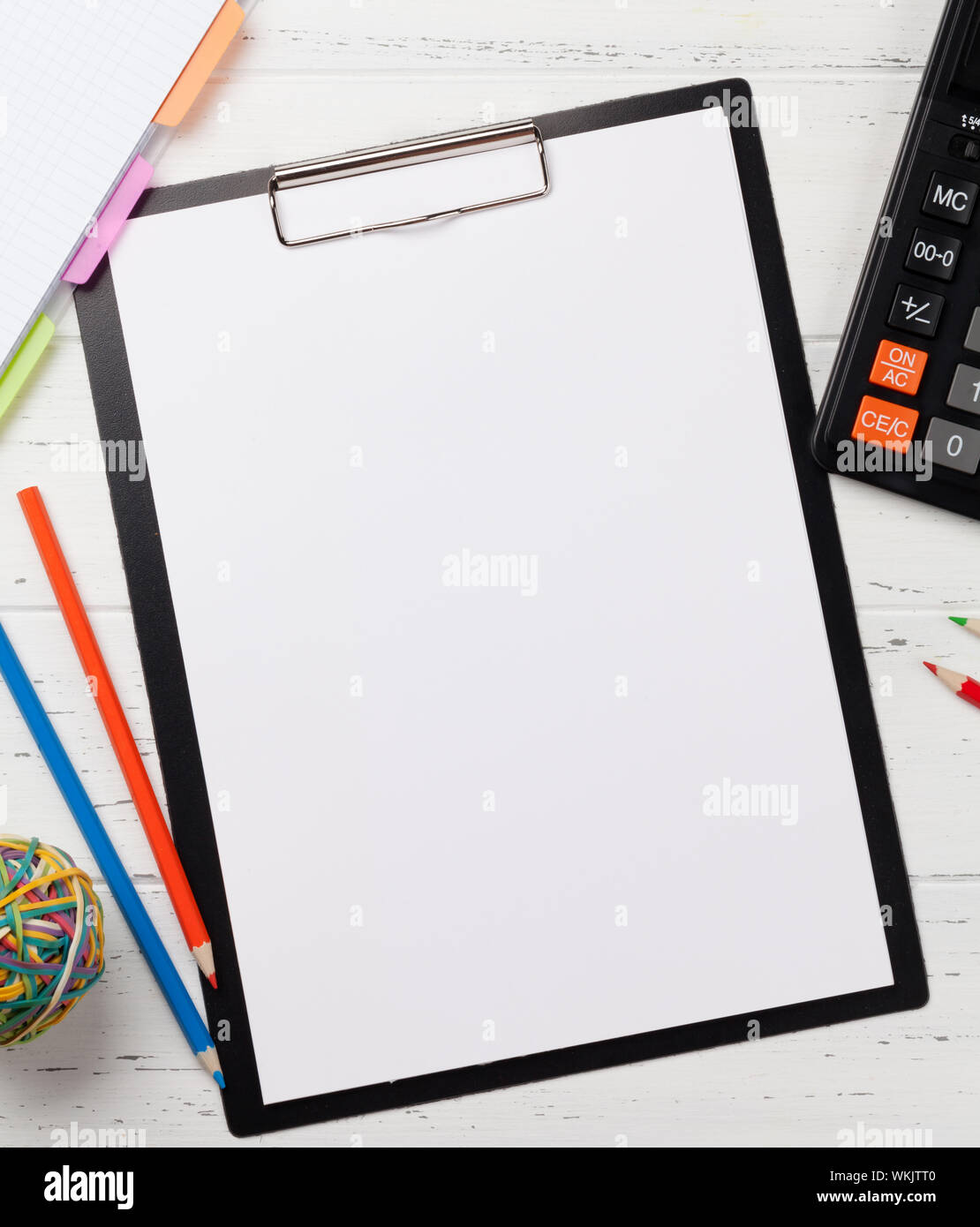 Office workplace table with blank a4 page and supplies. Flat lay. Top ...