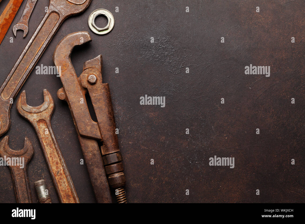 Vintage old tools on stone backdrop. Top view with copy space. Flat lay ...