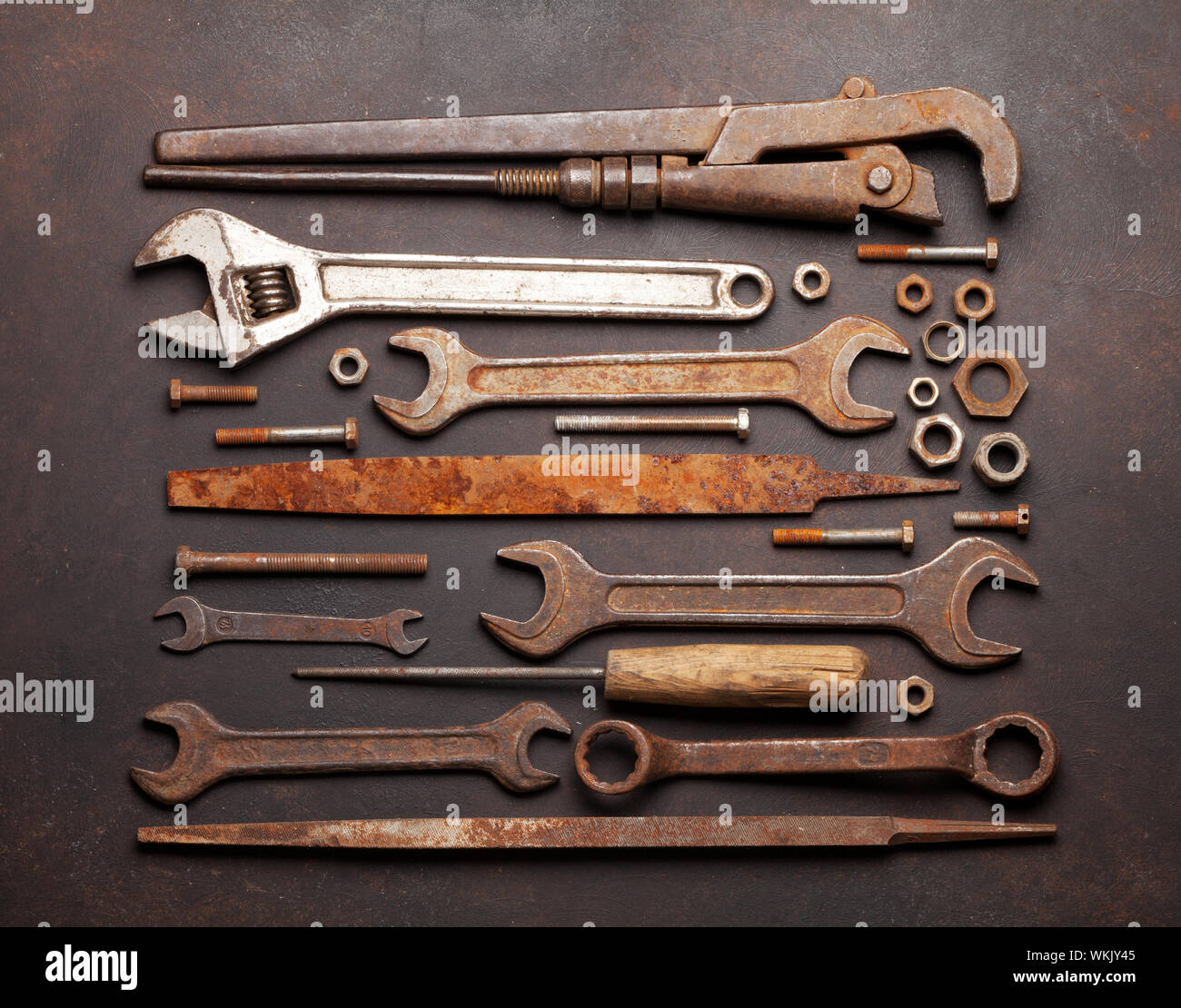 Vintage old tools on stone backdrop. Top view. Flat lay Stock Photo - Alamy