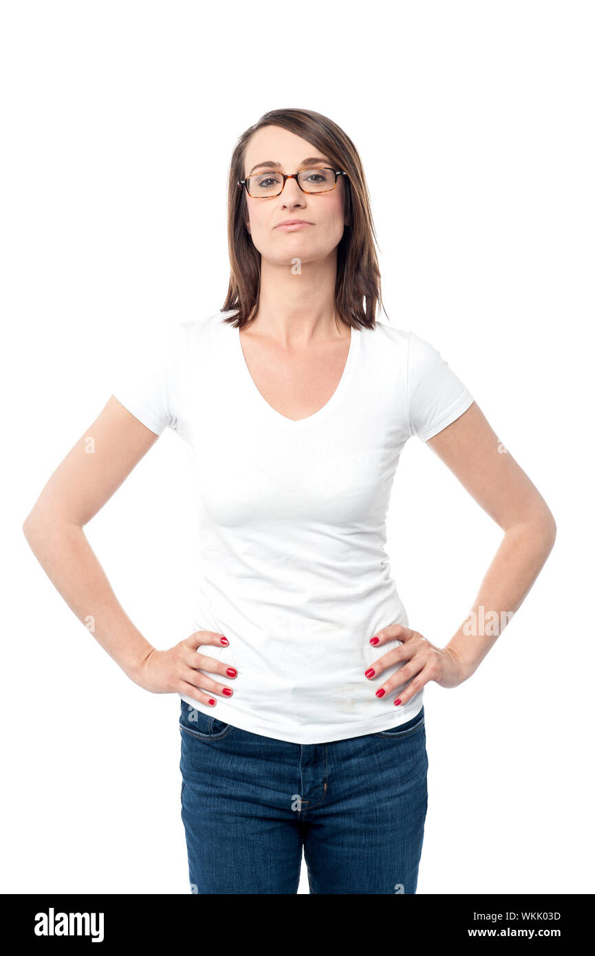 Gorgeous woman standing with hands on her waist Stock Photo - Alamy