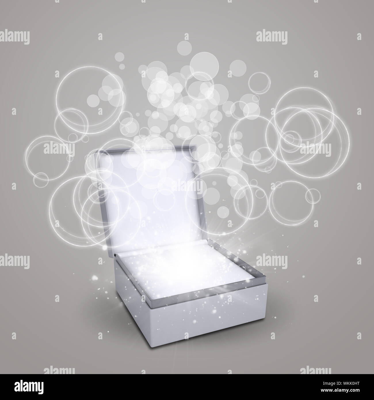 Jewelry box with magical circles of light on dark background Stock ...