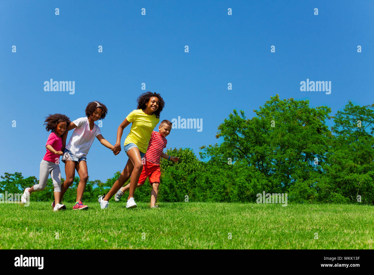 Diverse children playing school hi-res stock photography and images - Alamy