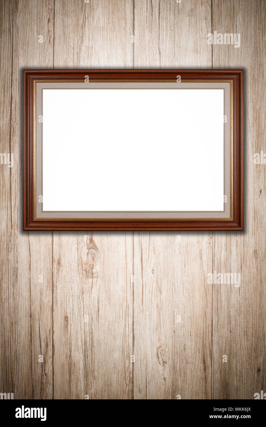Old picture frame on vintage wood wall Stock Photo - Alamy