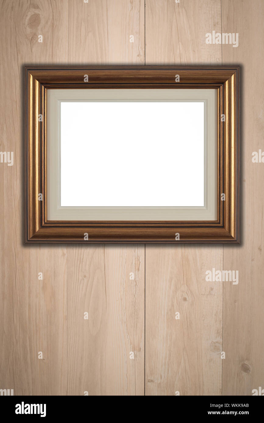 Old picture frame on vintage wood wall Stock Photo - Alamy