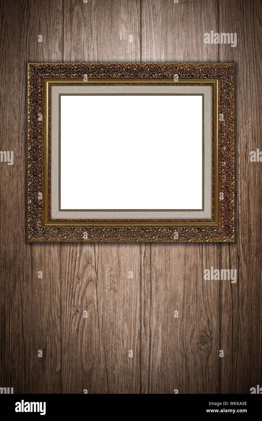 Old picture frame on vintage wood wall Stock Photo - Alamy