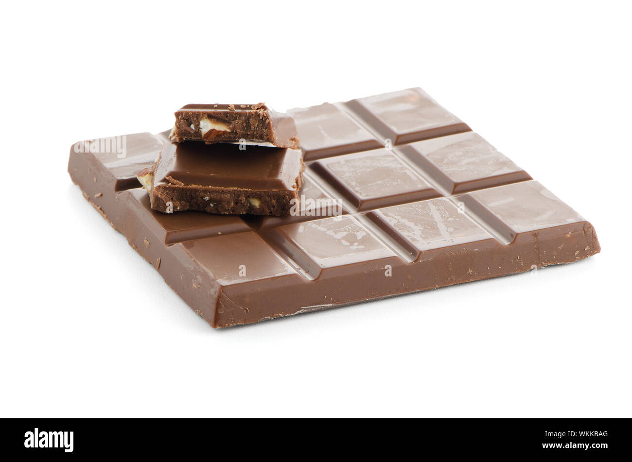 Closeup detail of chocolate parts on white background Stock Photo - Alamy