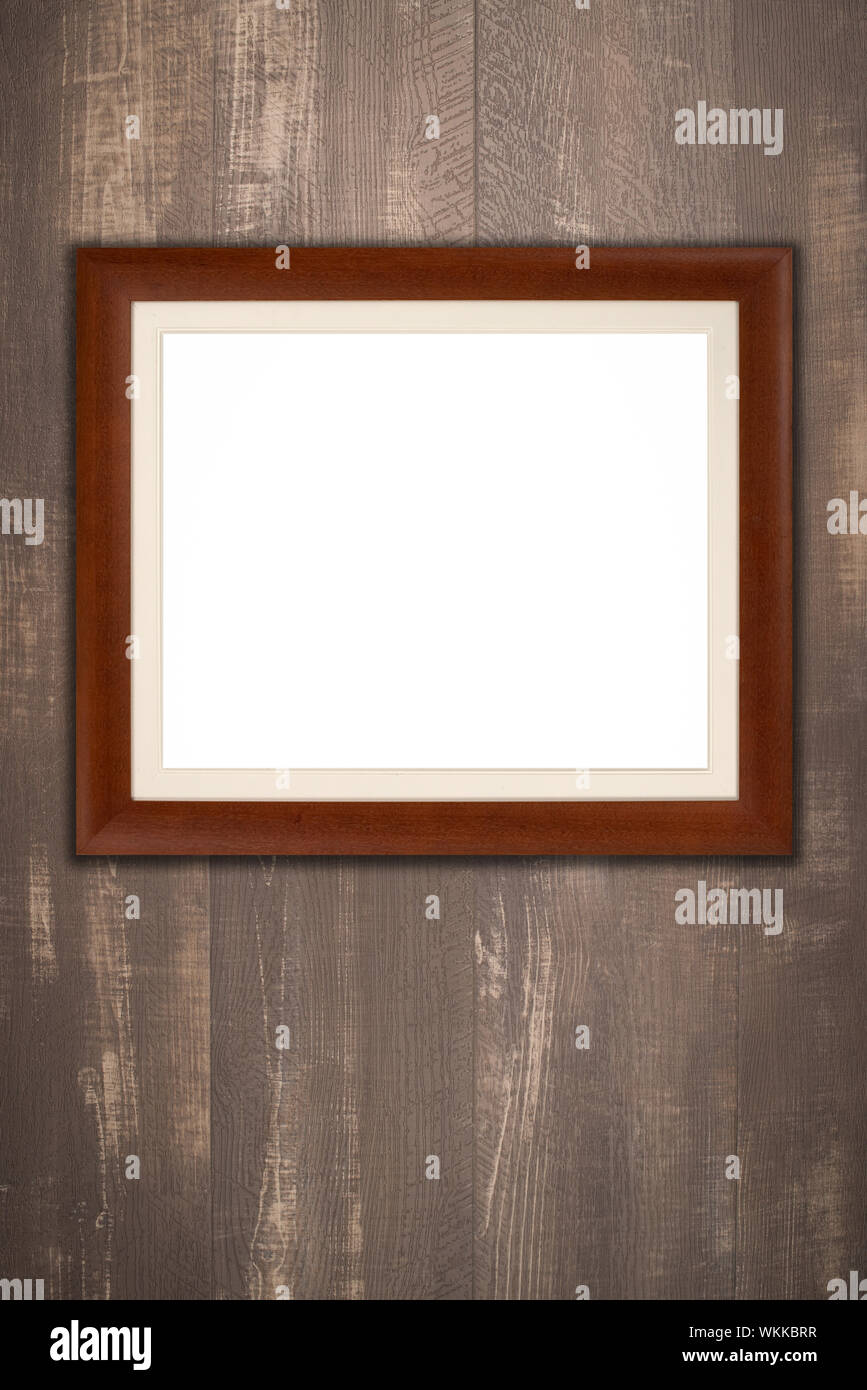 Old picture frame on vintage wood wall Stock Photo - Alamy
