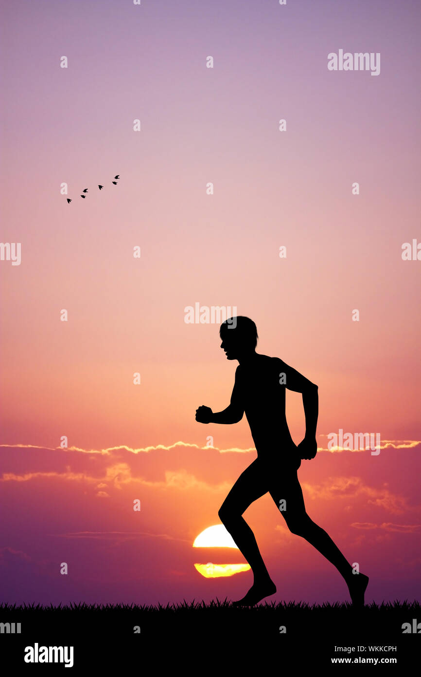 man running at sunset Stock Photo - Alamy
