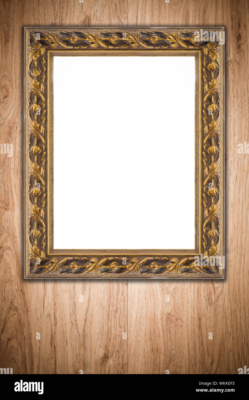 Old picture frame on vintage wood wall Stock Photo - Alamy