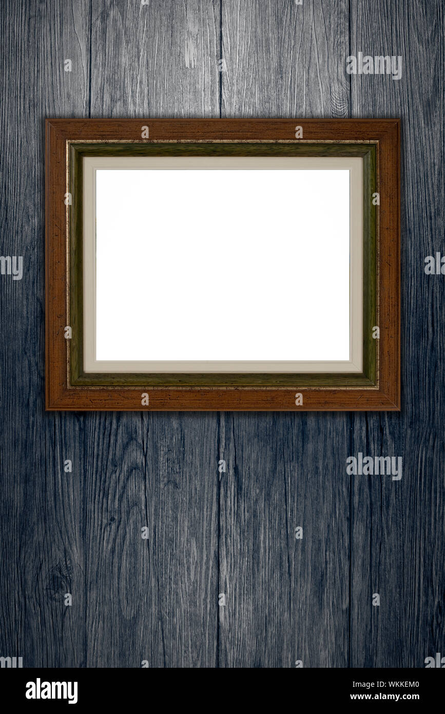 Old picture frame on vintage wood wall Stock Photo - Alamy