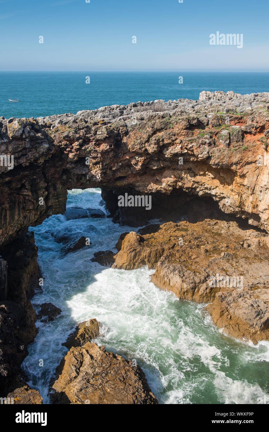 The rocky coastline of Cascais is famous for the cave named, The jaws ...