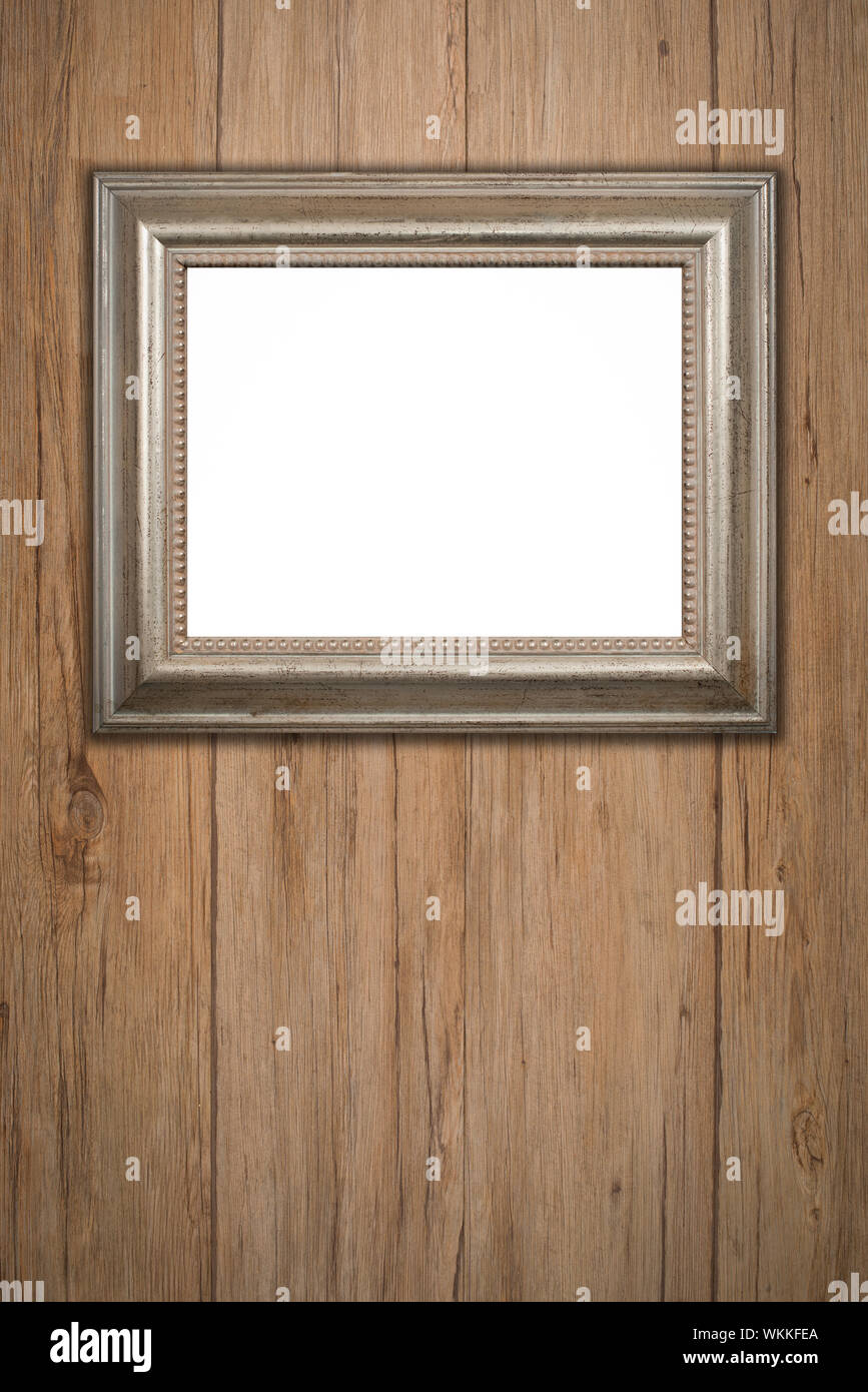 Old picture frame on vintage wood wall Stock Photo - Alamy