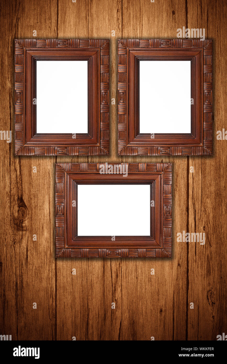 Old picture frame on vintage wood wall Stock Photo - Alamy