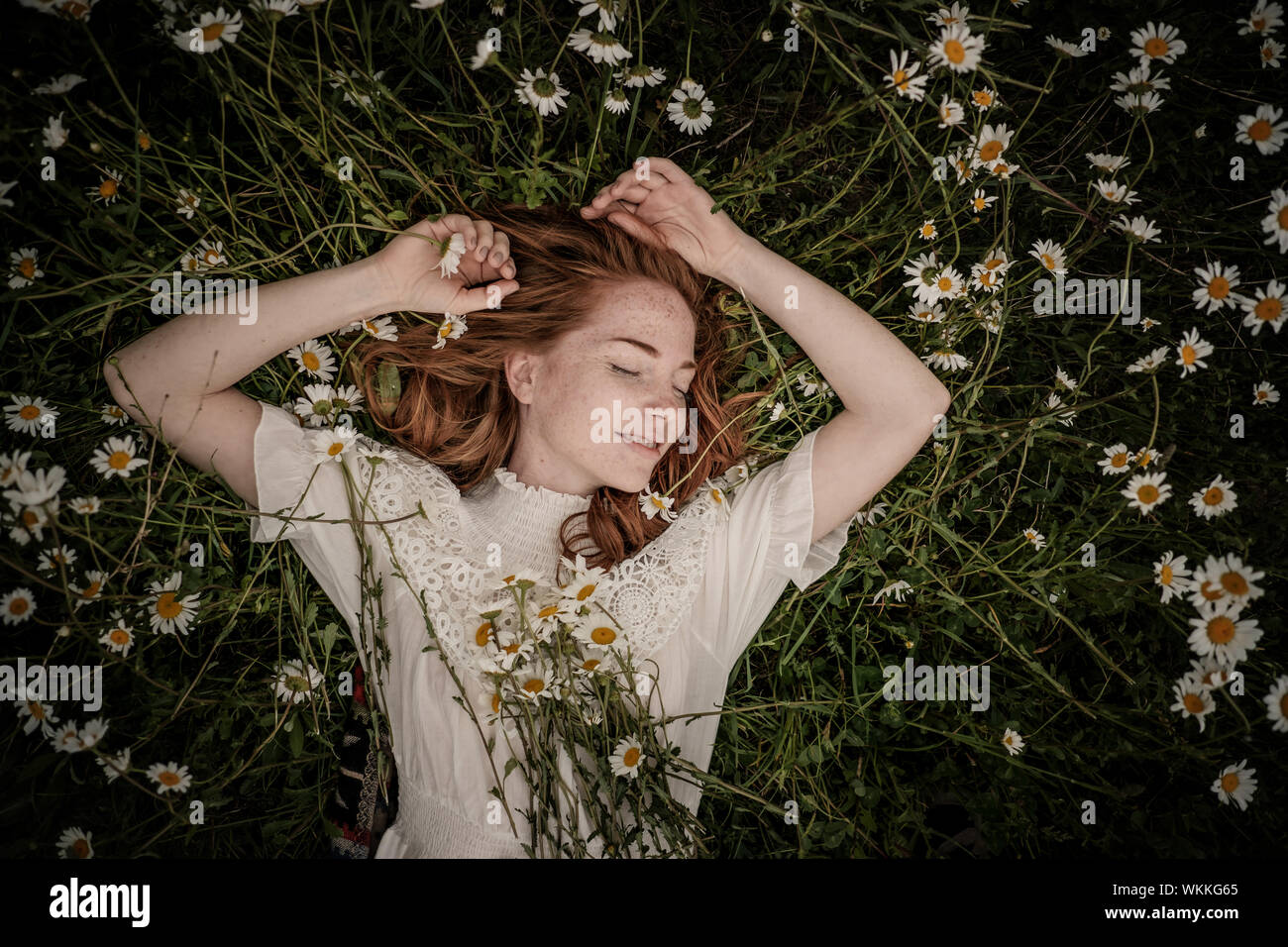 Woman Laying In Flowers