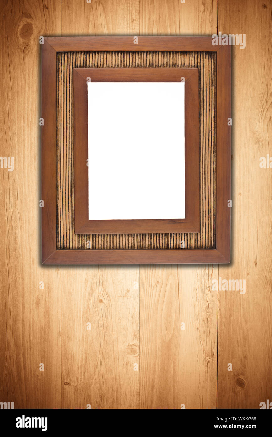 Old picture frame on vintage wood wall Stock Photo - Alamy
