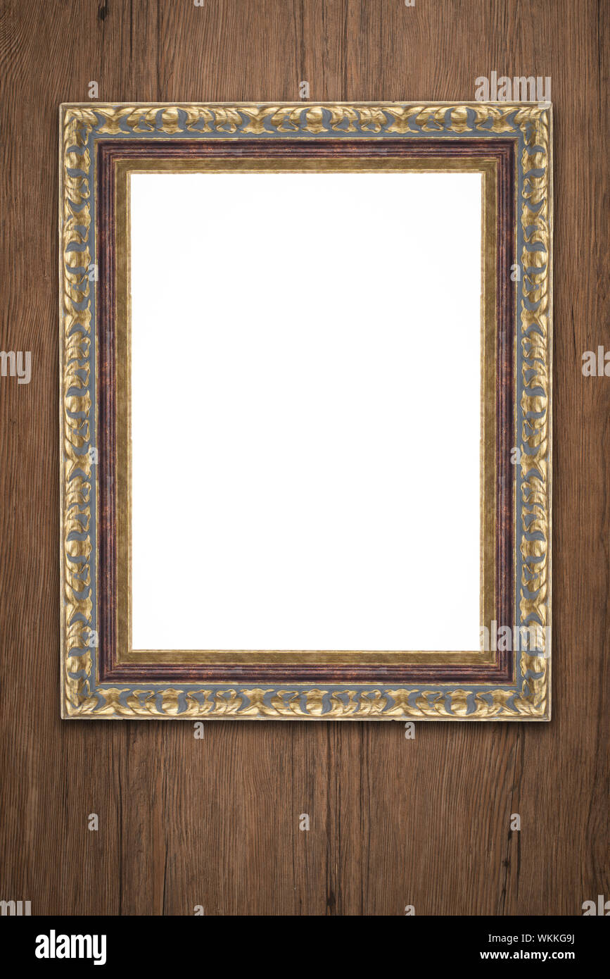 Old picture frame on vintage wood wall Stock Photo - Alamy
