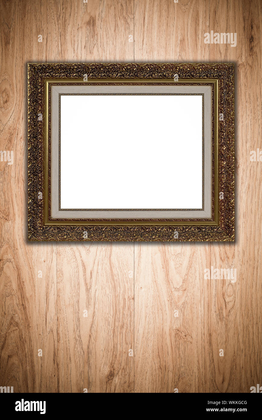 Old picture frame on vintage wood wall Stock Photo - Alamy