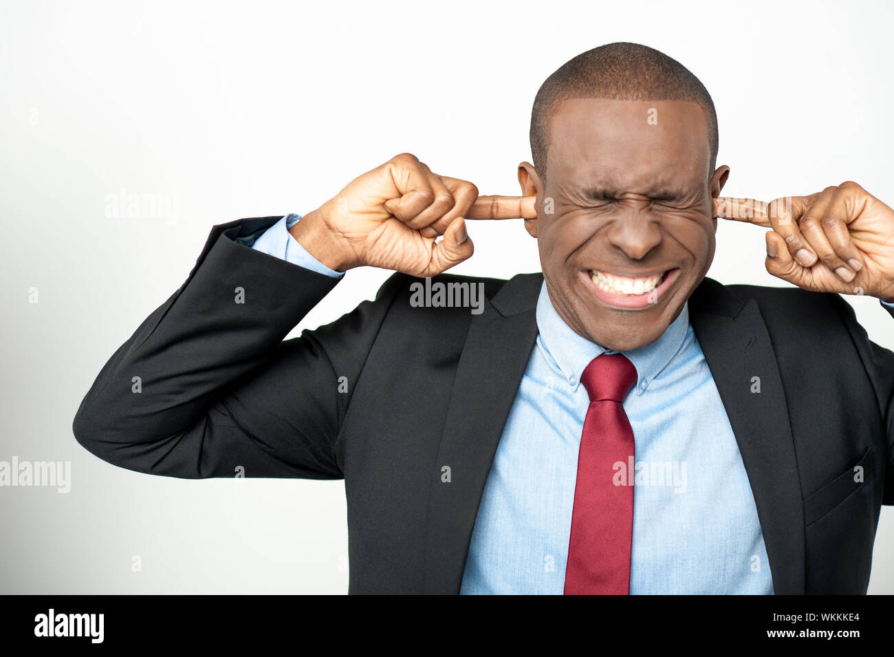 Middle aged businessman closing eyes hi-res stock photography and ...