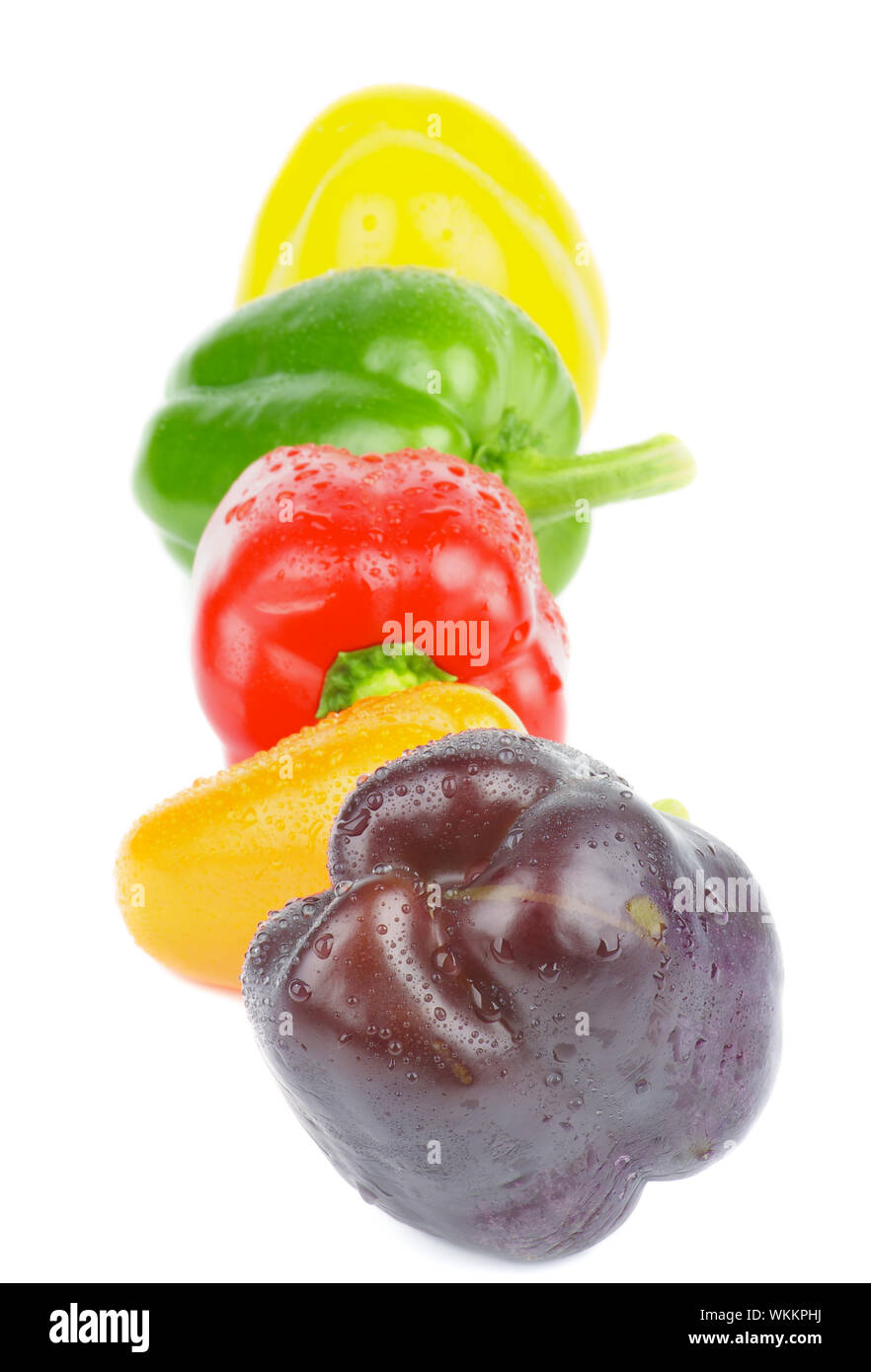 Various Mix Fresh Colorful Bell Peppers In a Row isolated on white ...