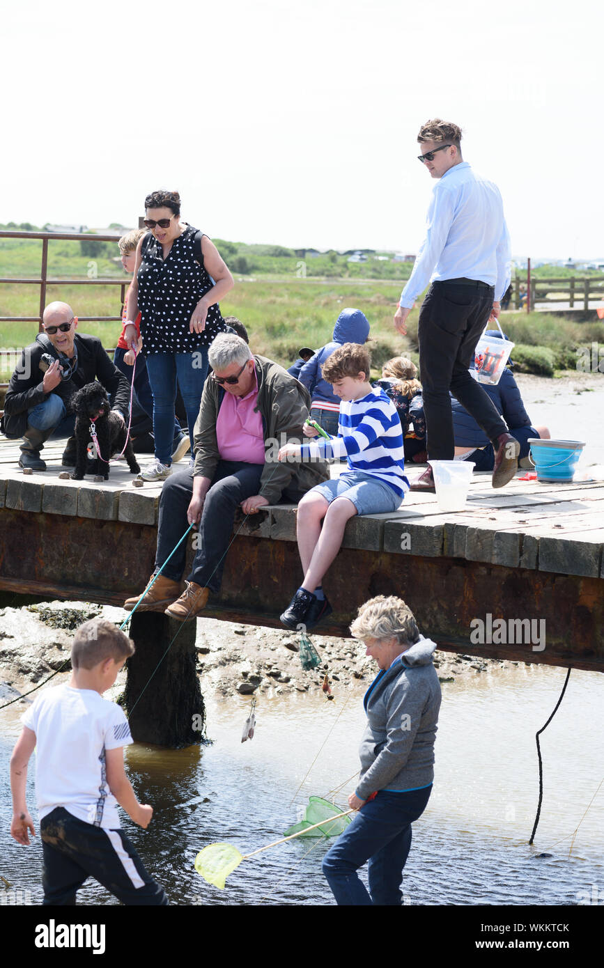 WALBERSWICK, SUFFOLK/ENGLAND - 9TH JUNE 2019 - People crabbing for fun ...