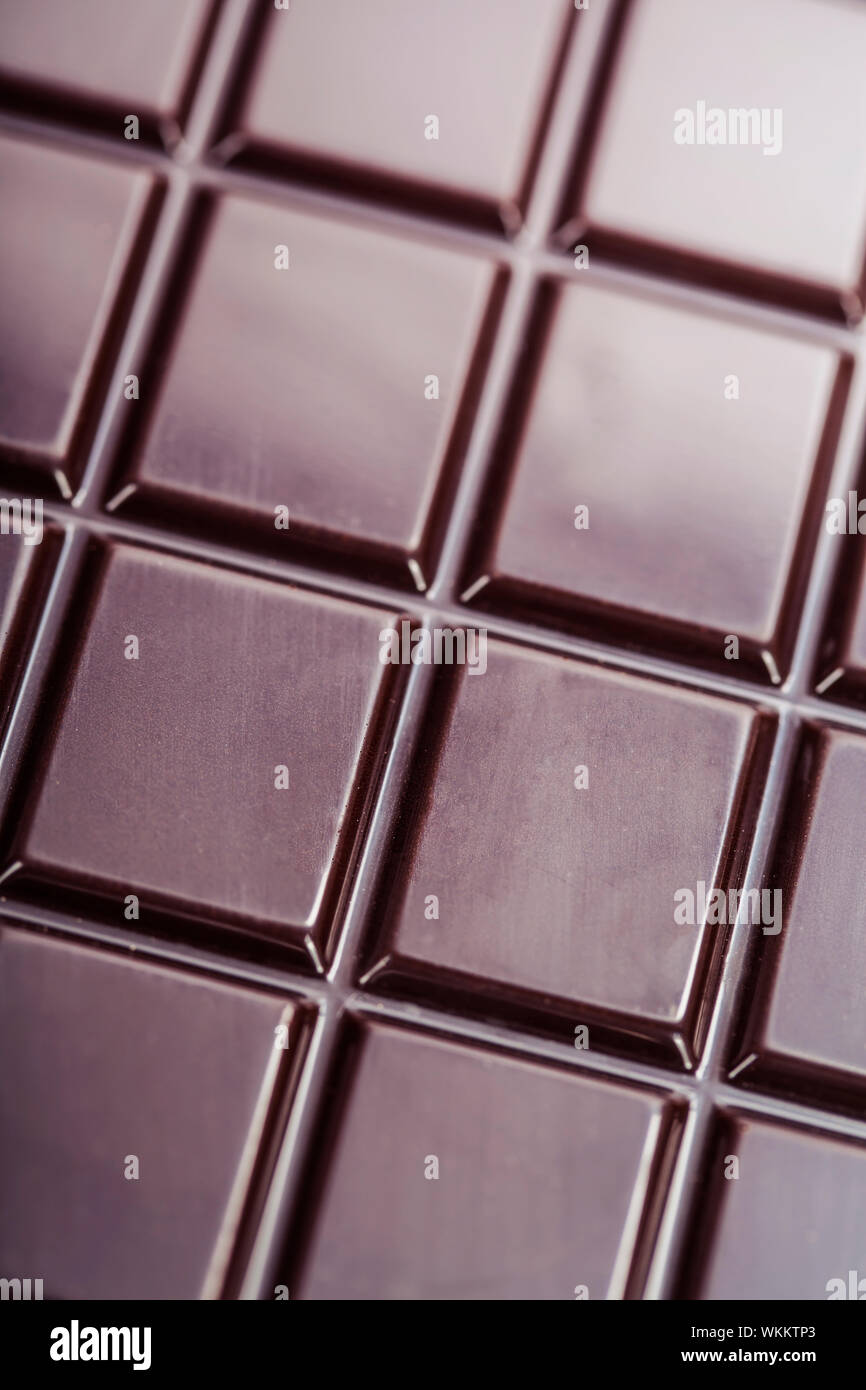dark chocolate bar as background Stock Photo - Alamy