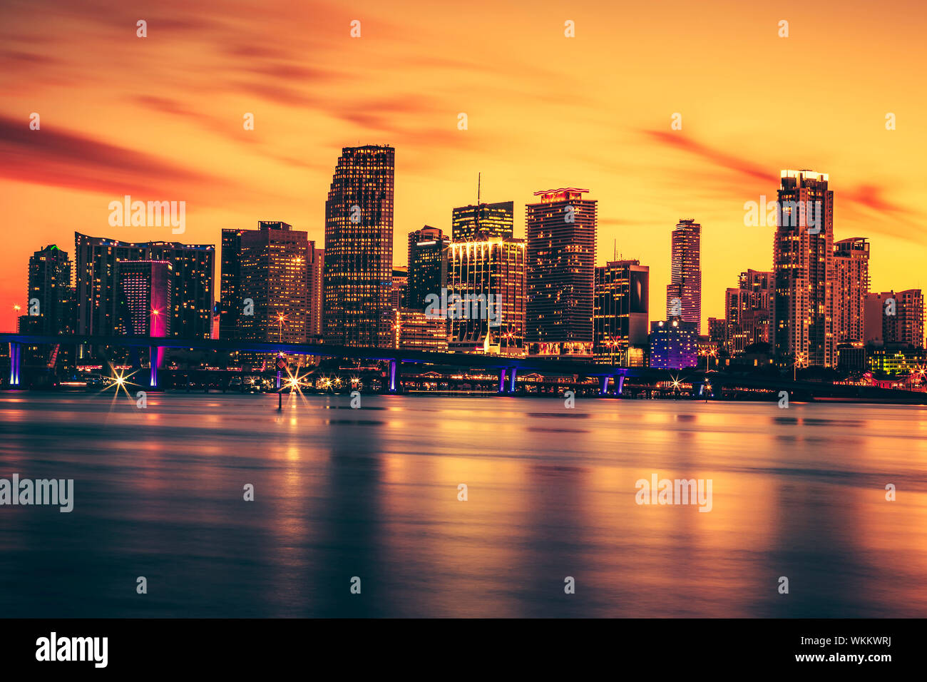 Sunset sky clouds biscayne bay water downtown miami city skyline hi-res ...