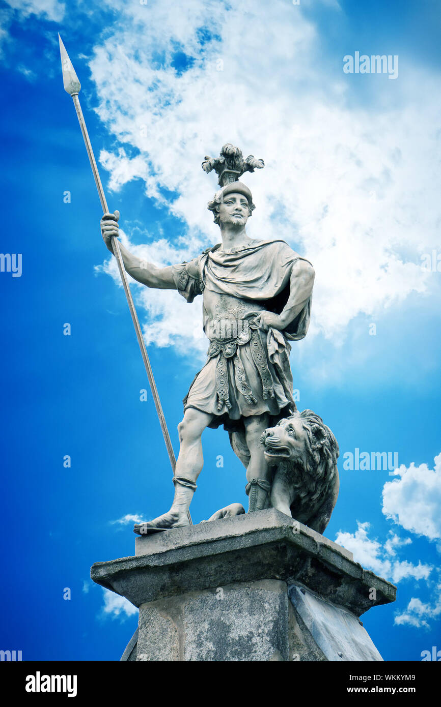 An image of a beautiful male statue with a lance Stock Photo - Alamy