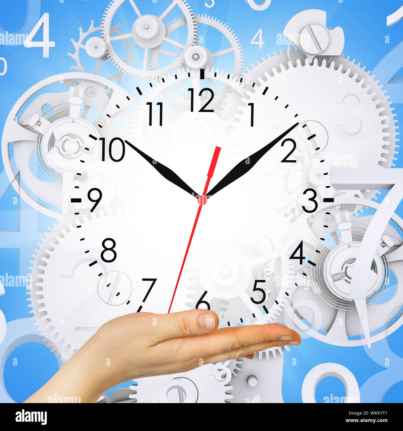 Hand hold clock with figures and gears. Blue background Stock Photo - Alamy