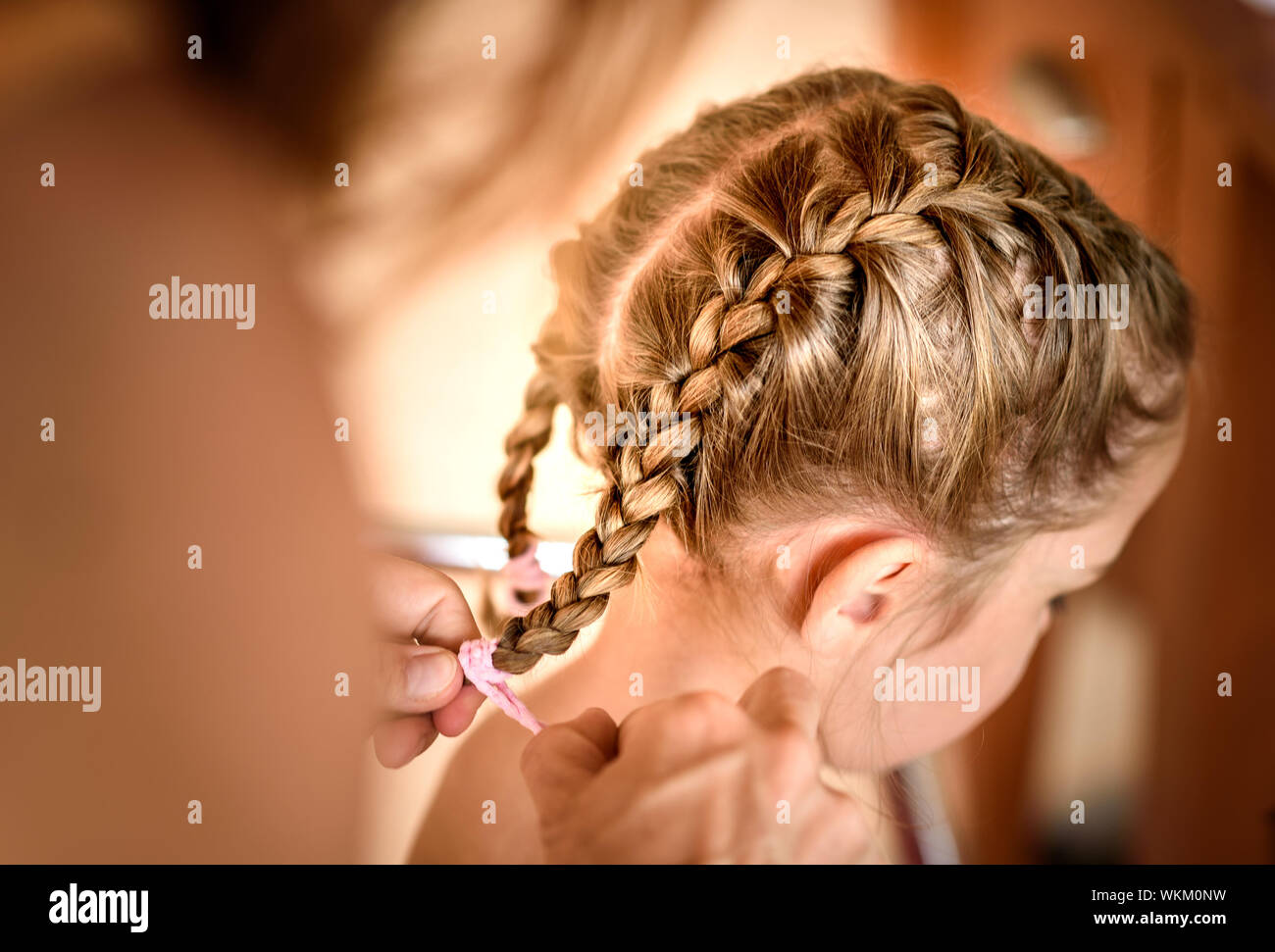 Child braiding hair hi-res stock photography and images - Alamy